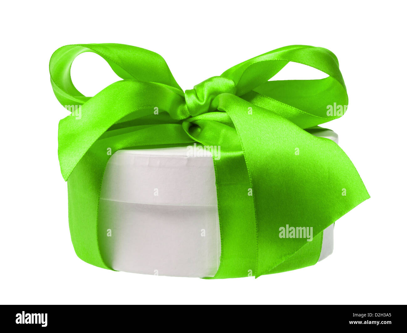 round gift box wrapped with ribbon, isolated on white background Stock ...