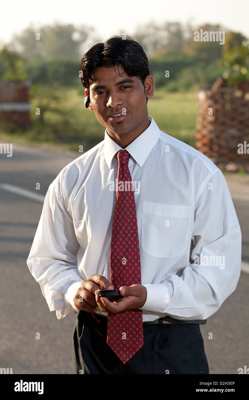 India, uttar Pradesh, Agra Indian businessman using smartphone and ...