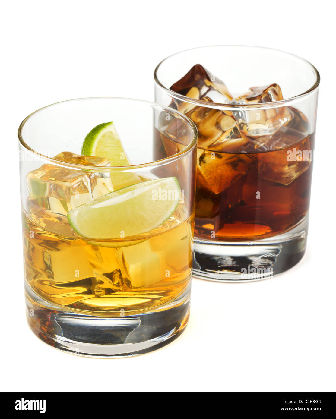 Whiskey and cola cocktails. Isolated on white background Stock Photo ...