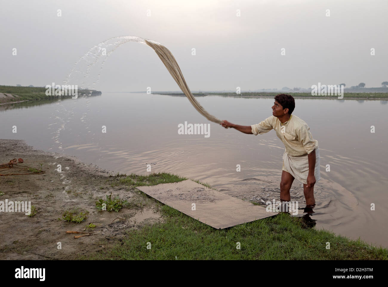India, uttar Pradesh, Agra, Dhobi-Wallah washing clothes by hand in ...