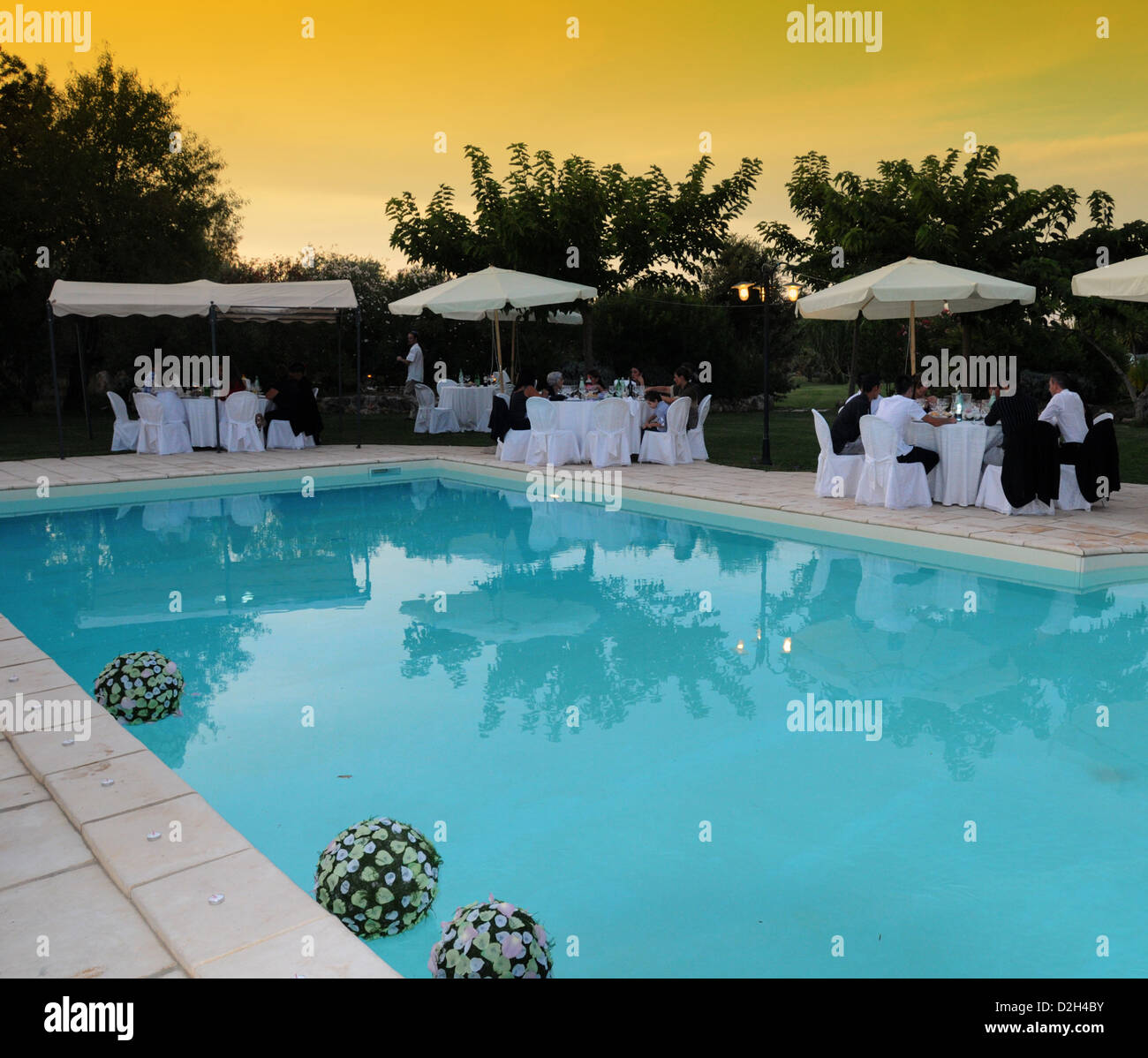 Evening buffet set up on poolside Stock Photo - Alamy