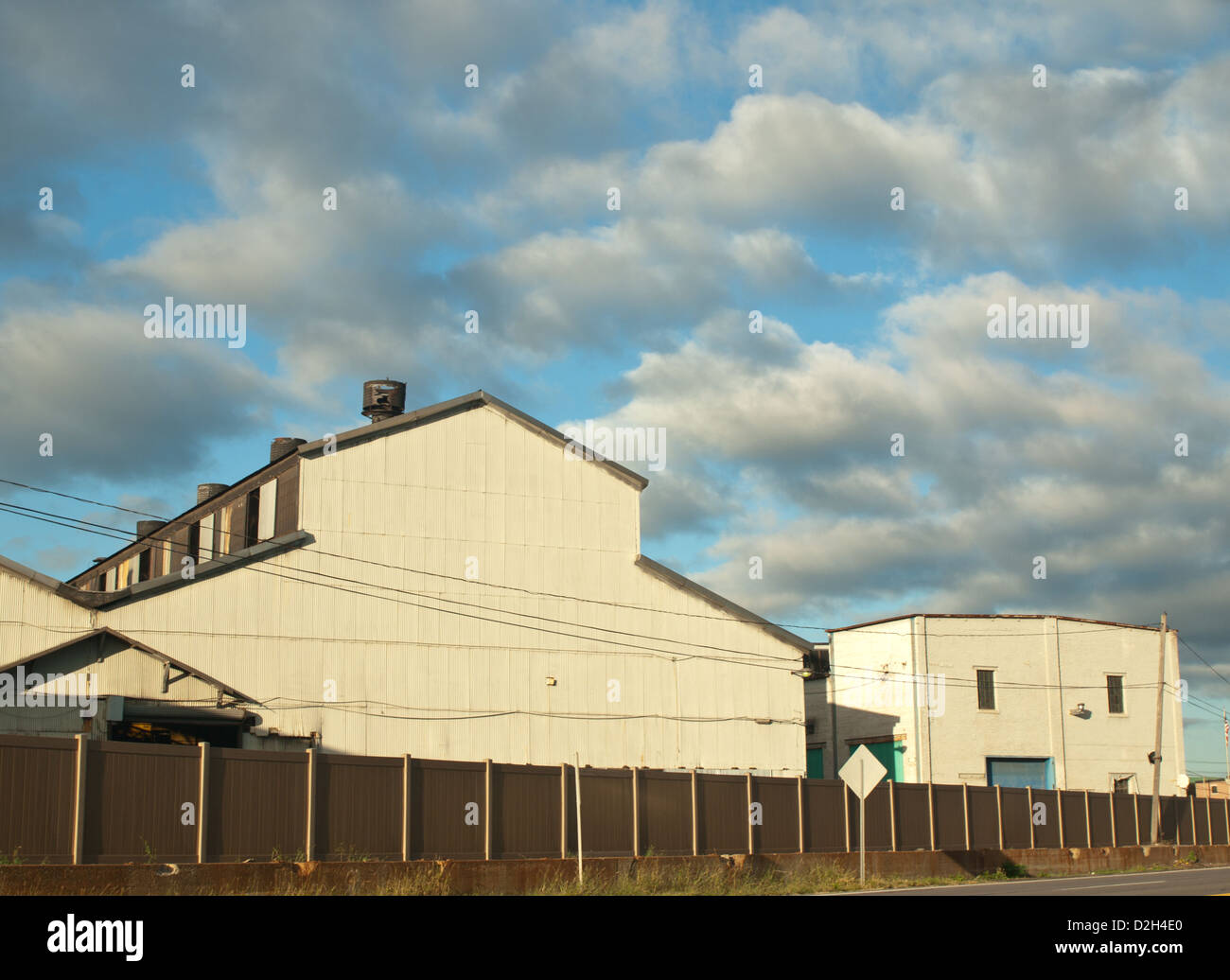Building buildings behind a metal fence hi-res stock photography and ...