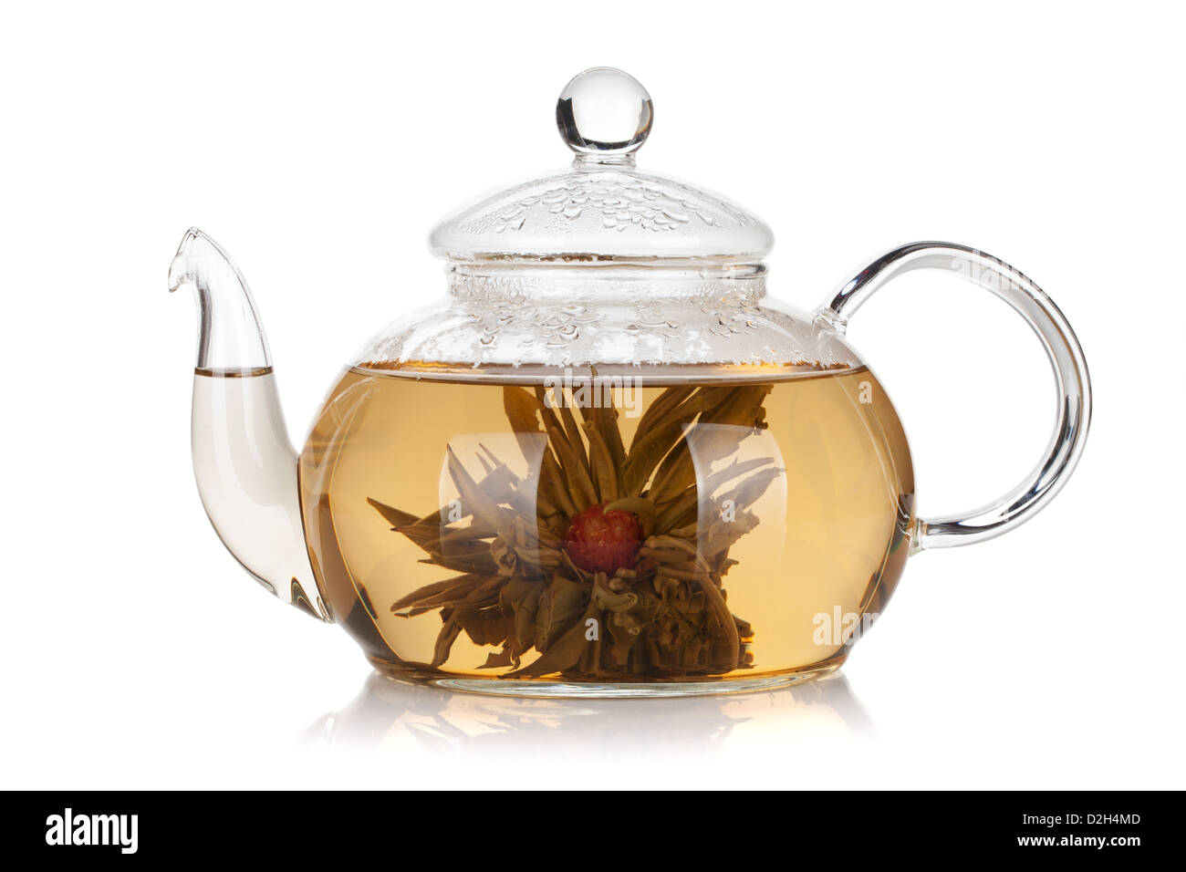 Glass teapot of aroma tea. Isolated on white background Stock Photo - Alamy