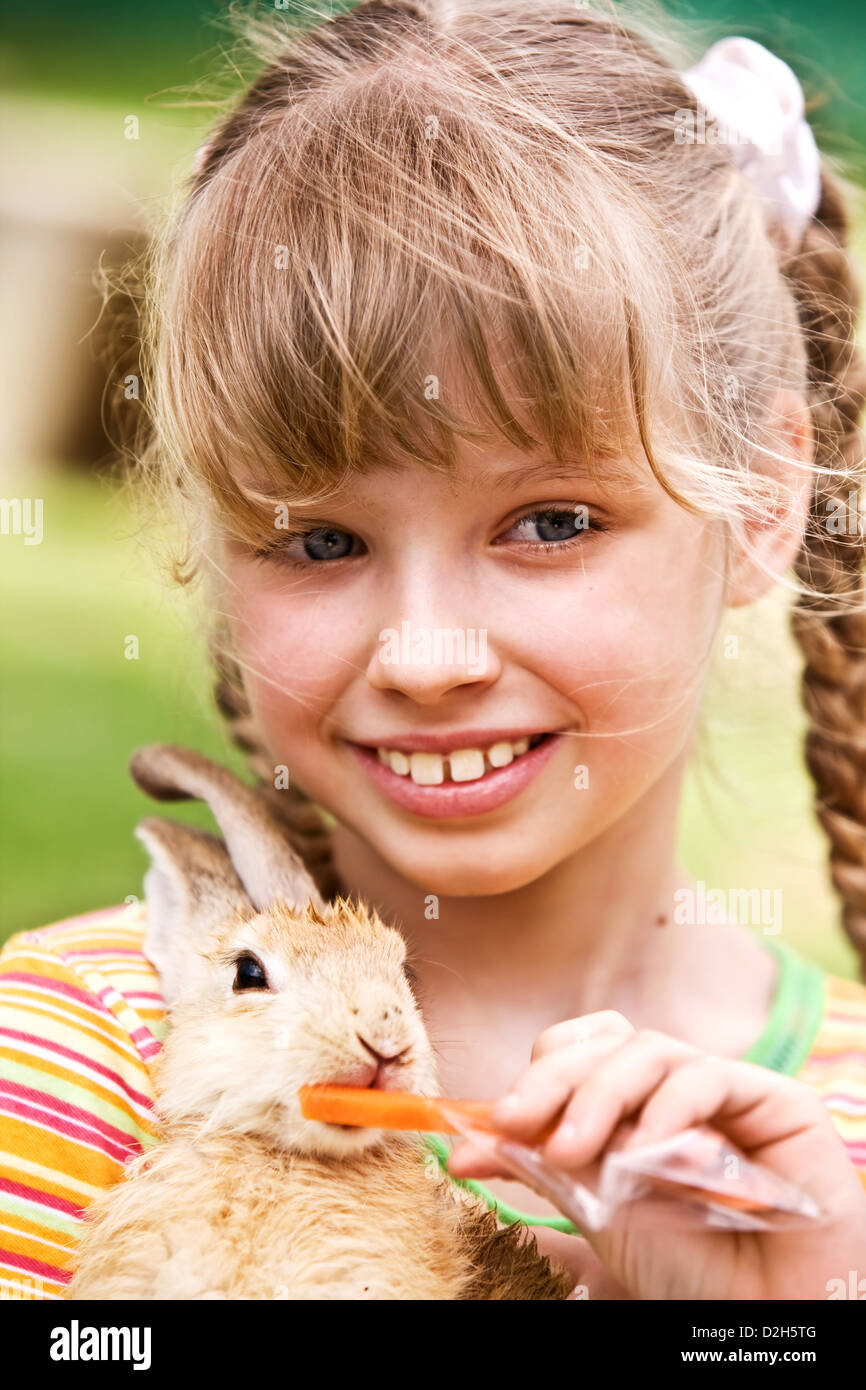 Child with rabbit Stock Photo - Alamy
