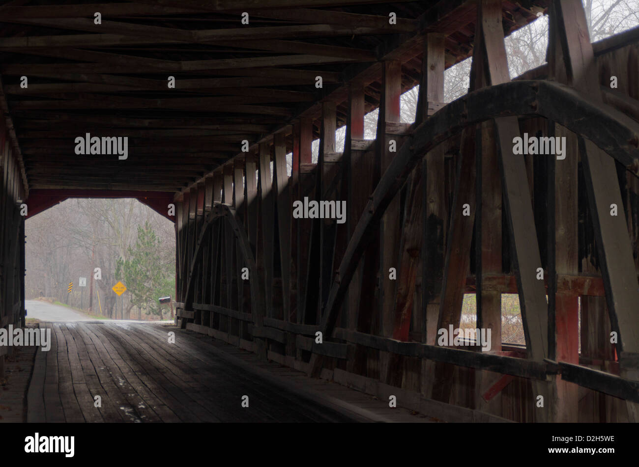 The interior of a covered bridge showcases the bridge's sturdy ...