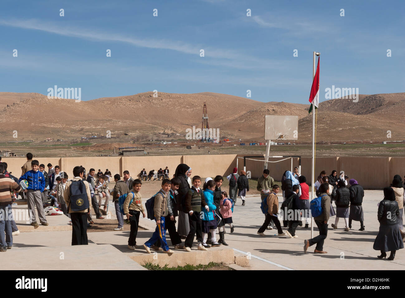 Primary and senior students in playground outside Iraqi Kurdish school ...