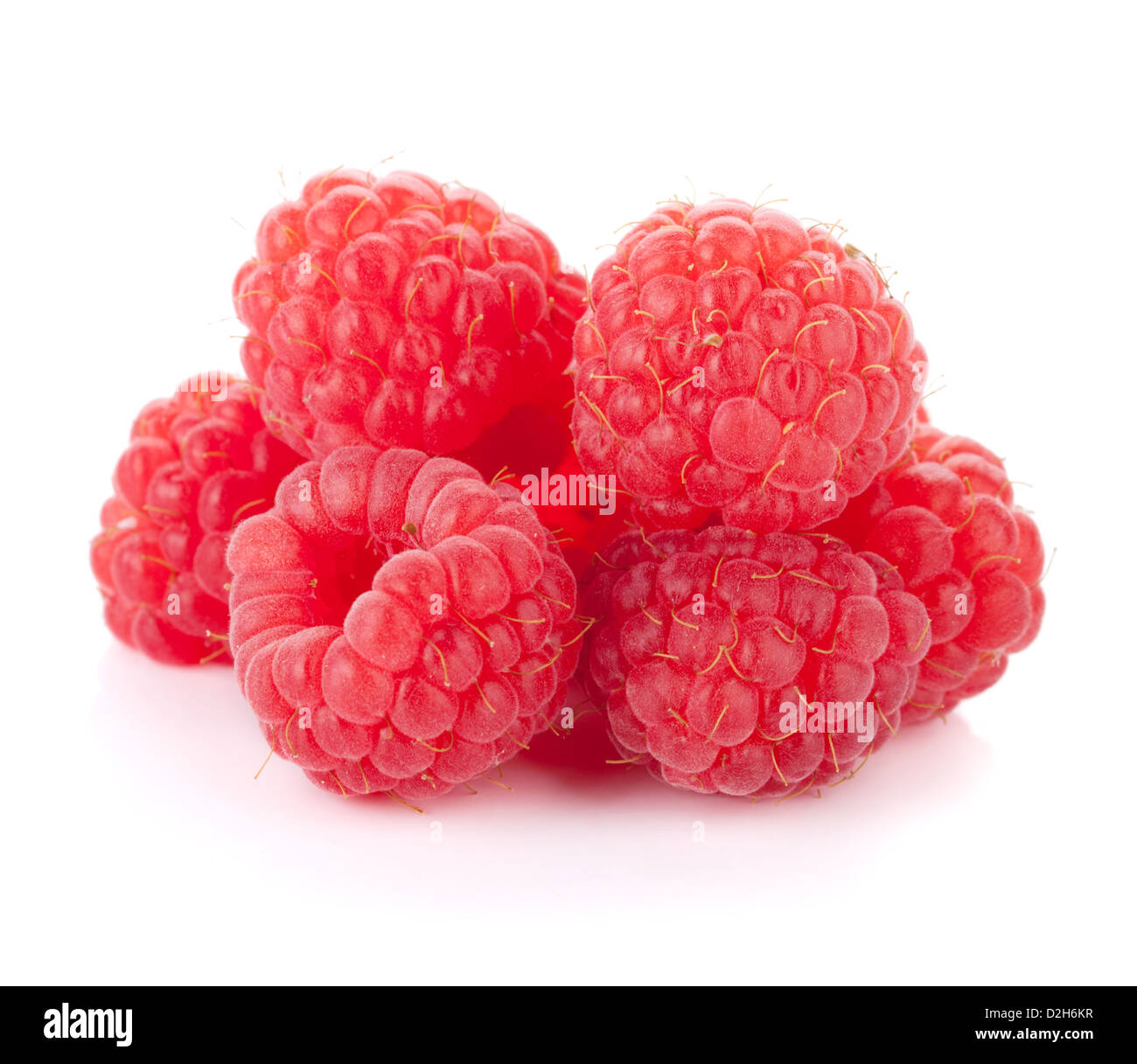 Fresh raspberry heap. Isolated on white background Stock Photo - Alamy