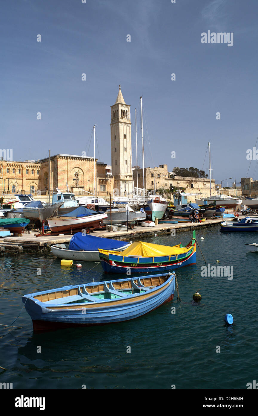 Malta, Marsascala, the church and harbour Stock Photo - Alamy