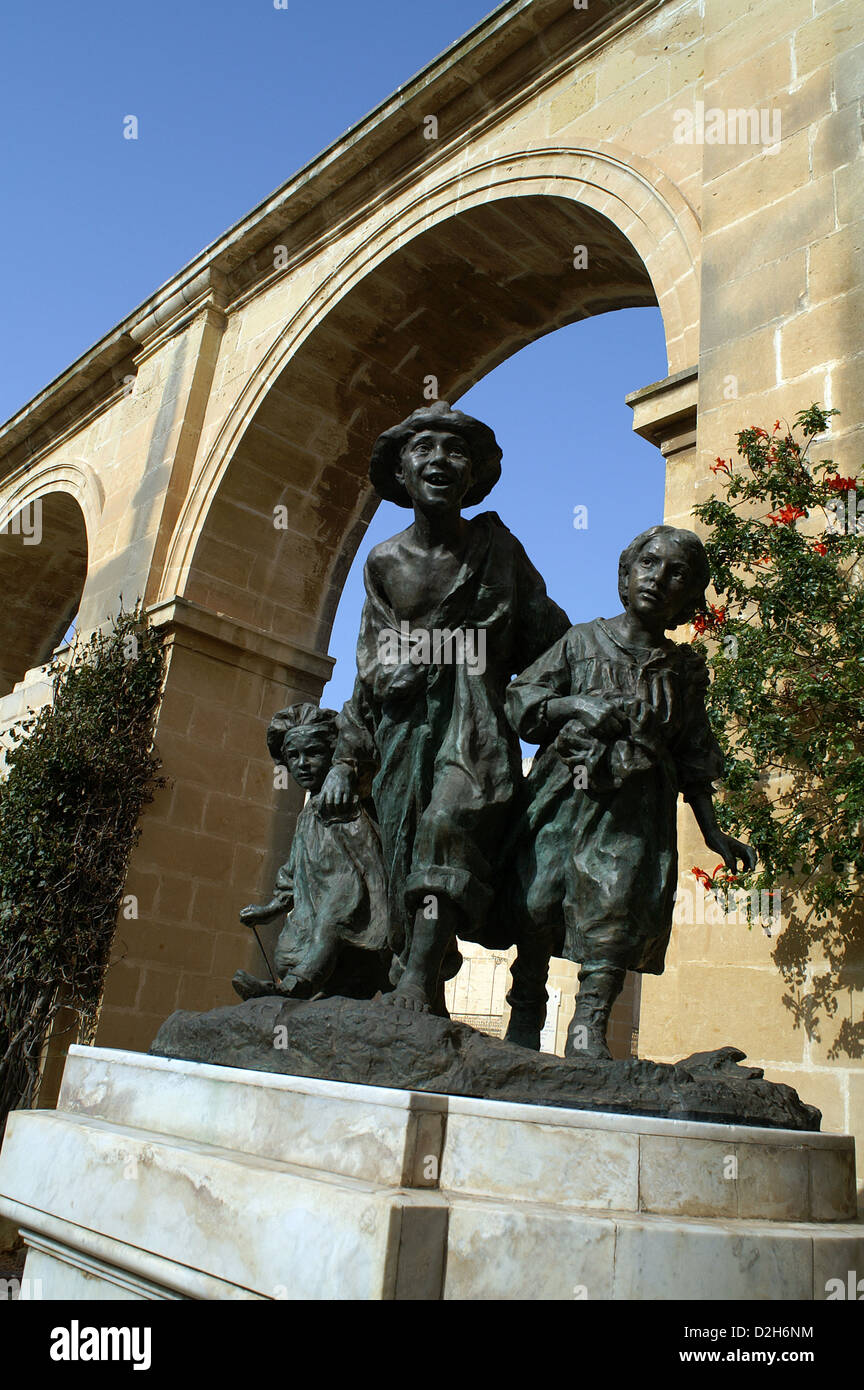 Malta, the arches and statue on the Valletta Ramparts Stock Photo - Alamy