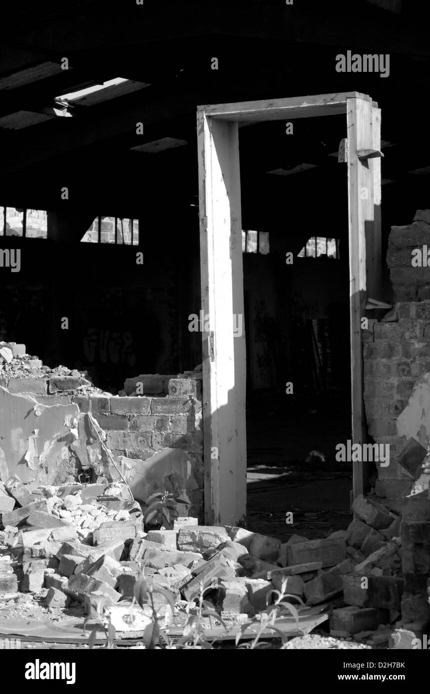 Collapsed brick wall of a derelict building Stock Photo - Alamy