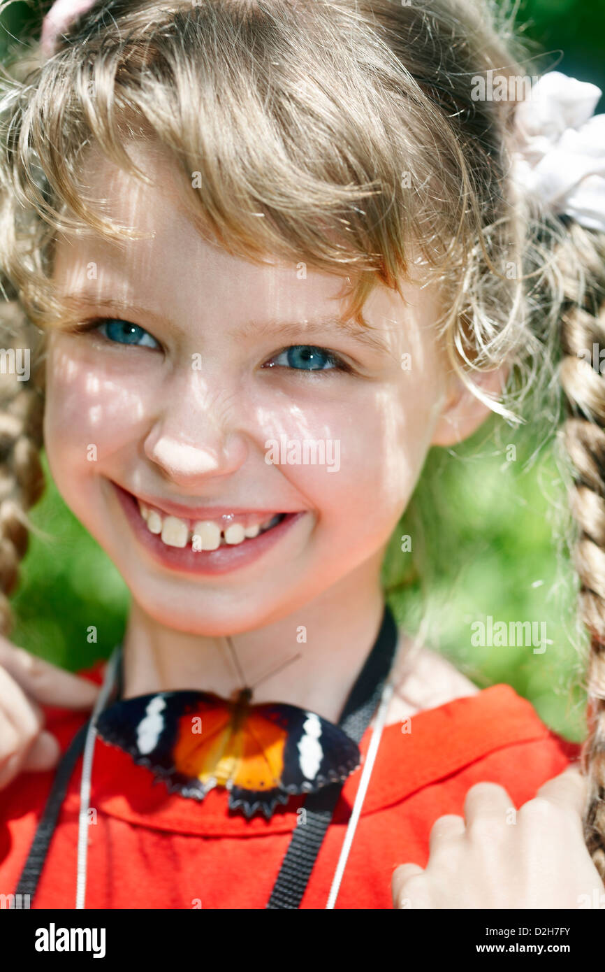 Kid touching butterfly hi-res stock photography and images - Alamy