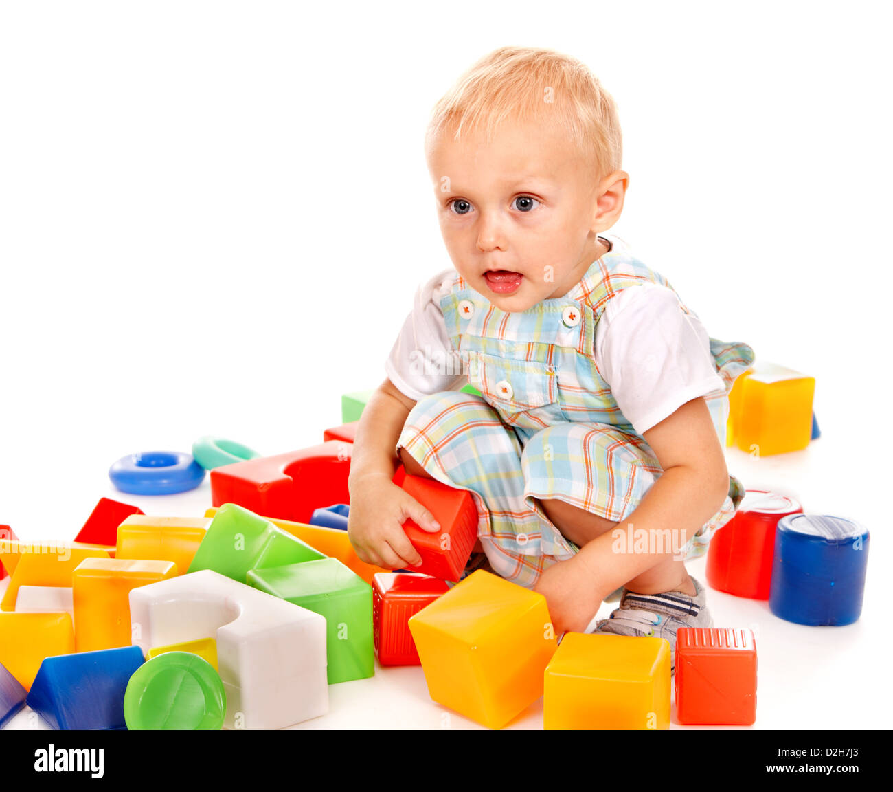 Happy children playing building blocks Stock Photo - Alamy