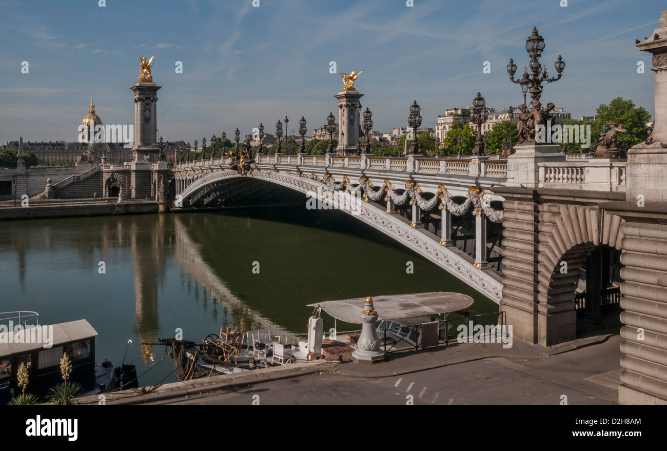 The Pont Alexandre III is a bridge that spans the Seine, connecting the ...