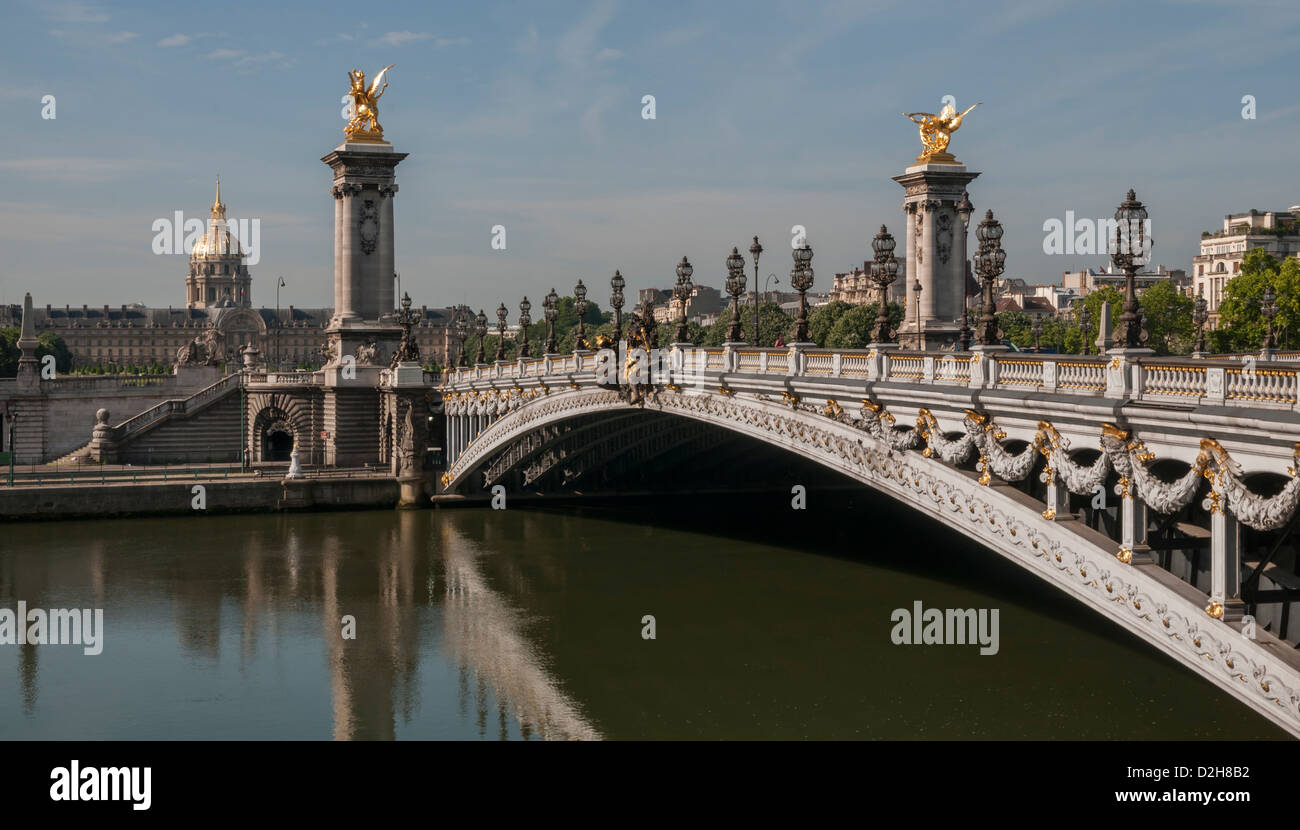 The Pont Alexandre III is a bridge that spans the Seine, connecting the ...