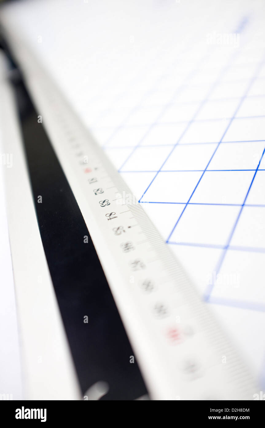 Measuring with a ruler. Preparing for cutting Stock Photo - Alamy