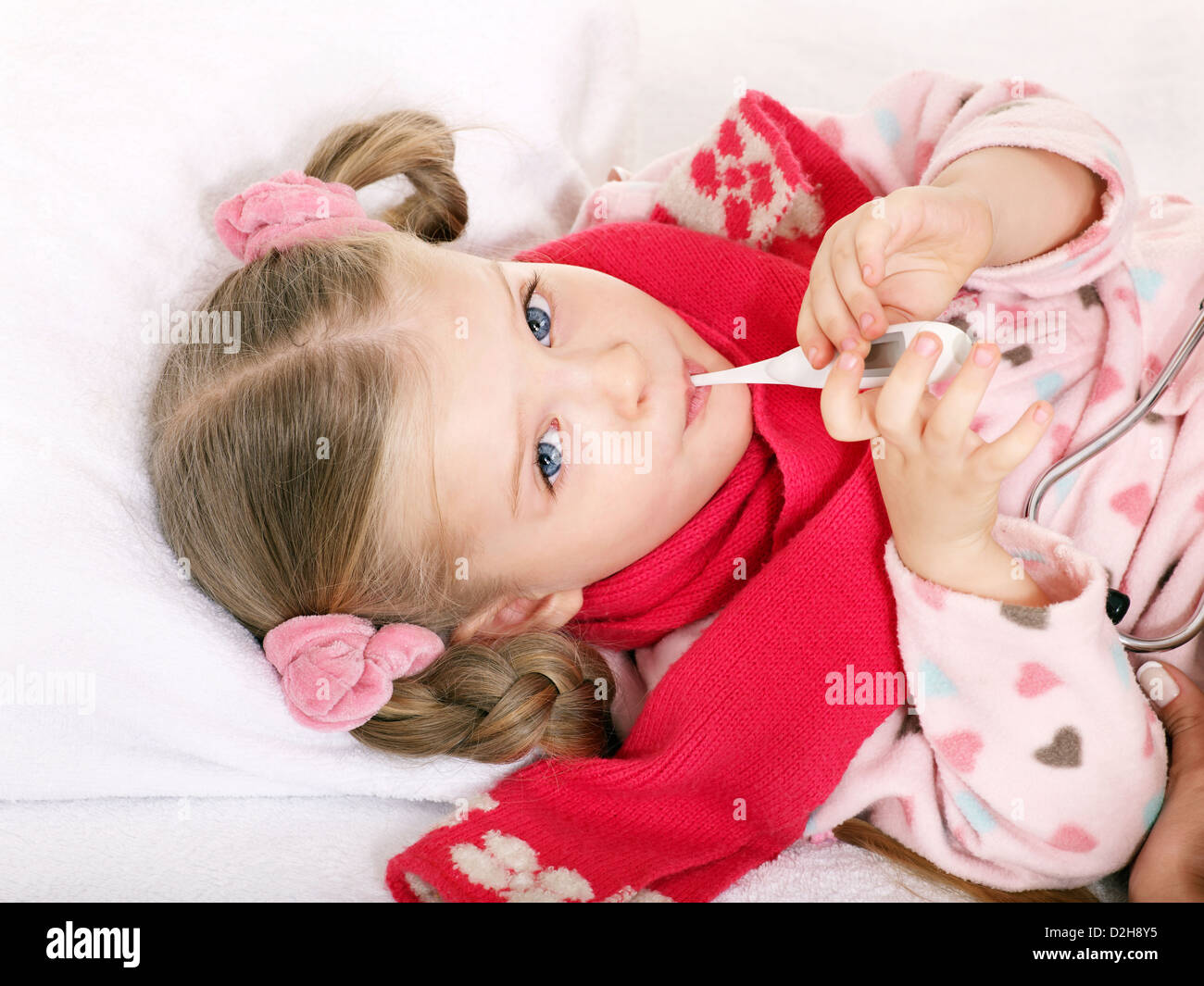 Sick child take medicine with doctor Stock Photo - Alamy
