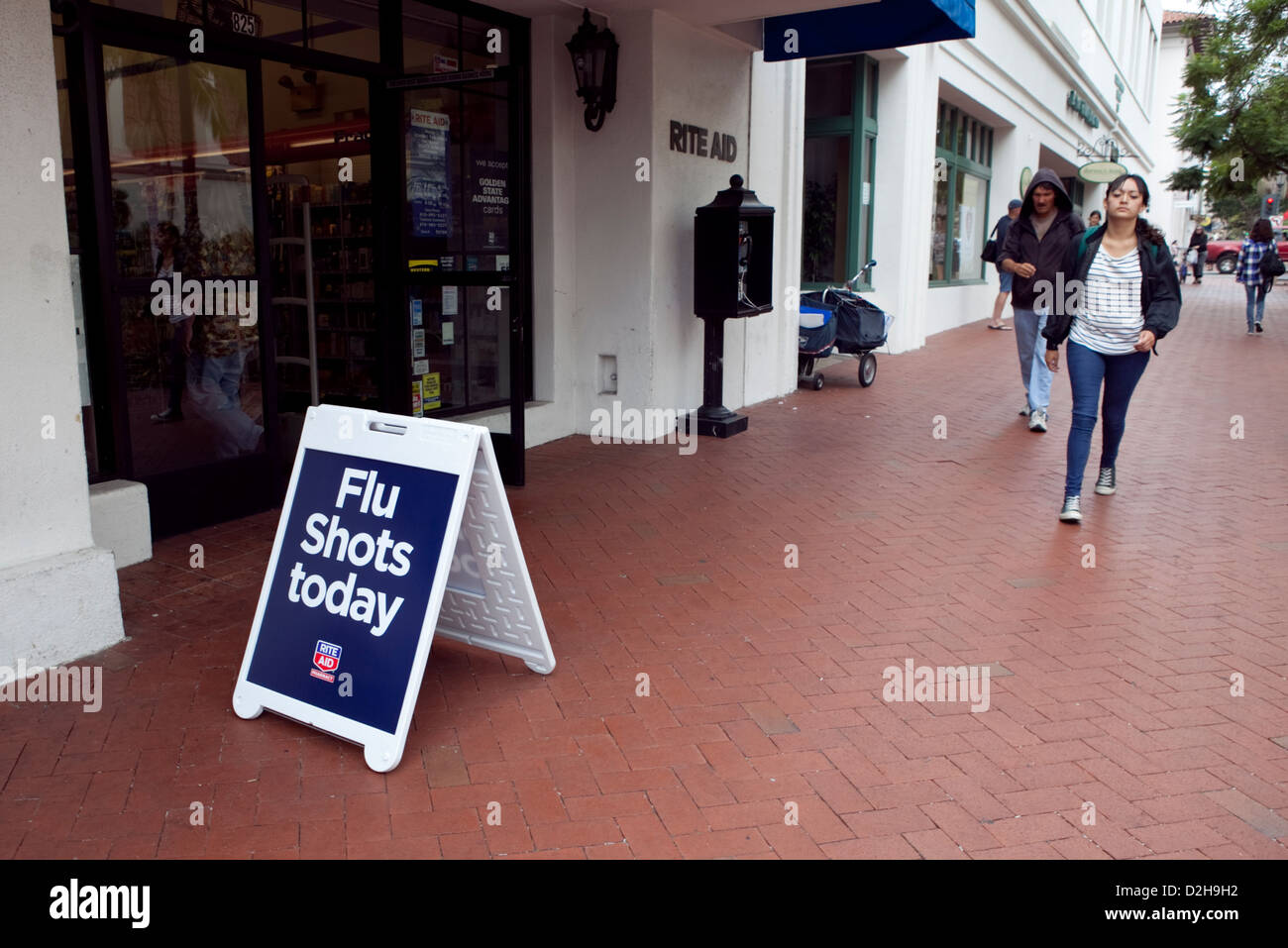 a pharmacy, drug store, in santa barbara, CA, advertising FLU SHOTS ...