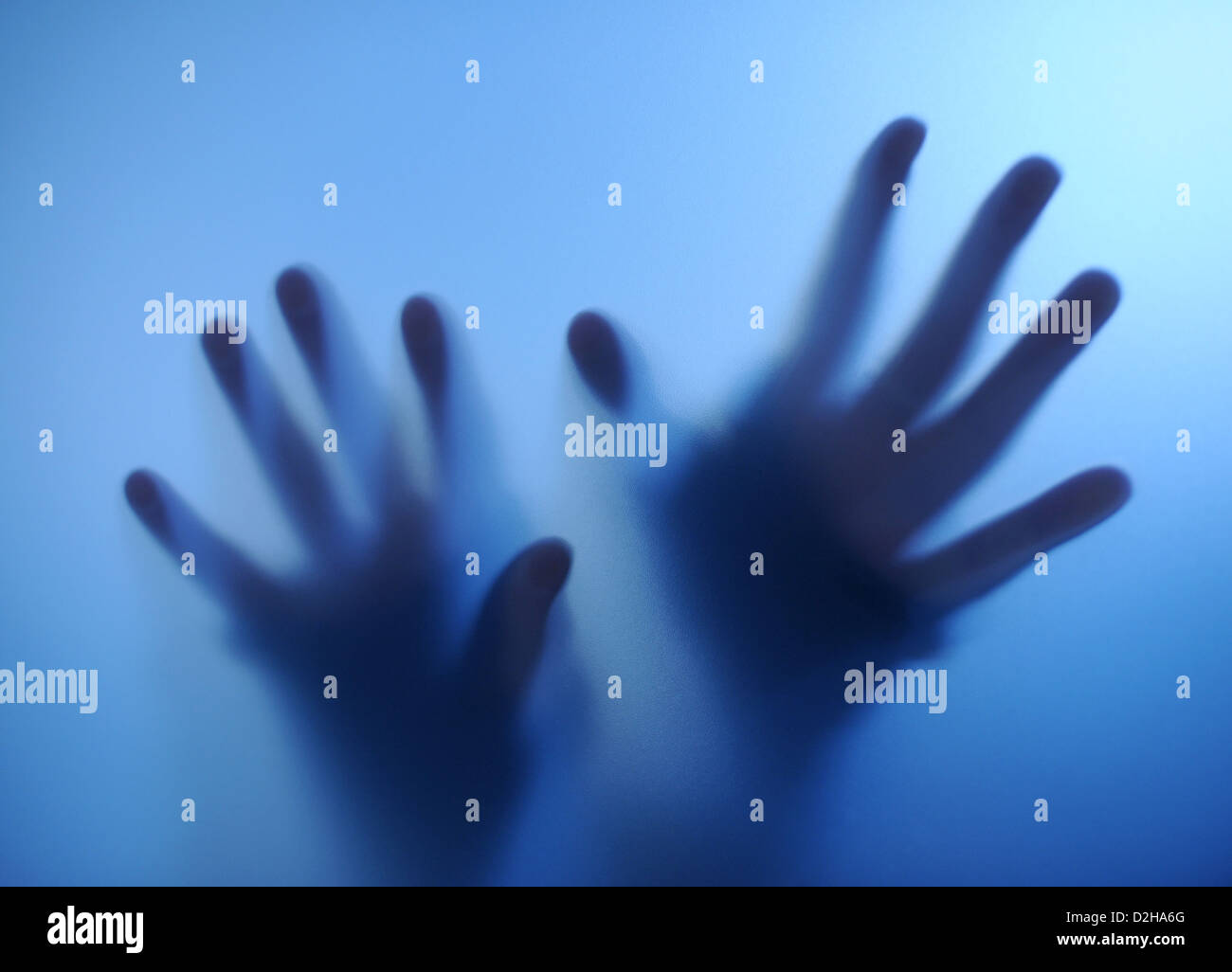 Hands behind frosted glass hi-res stock photography and images - Alamy