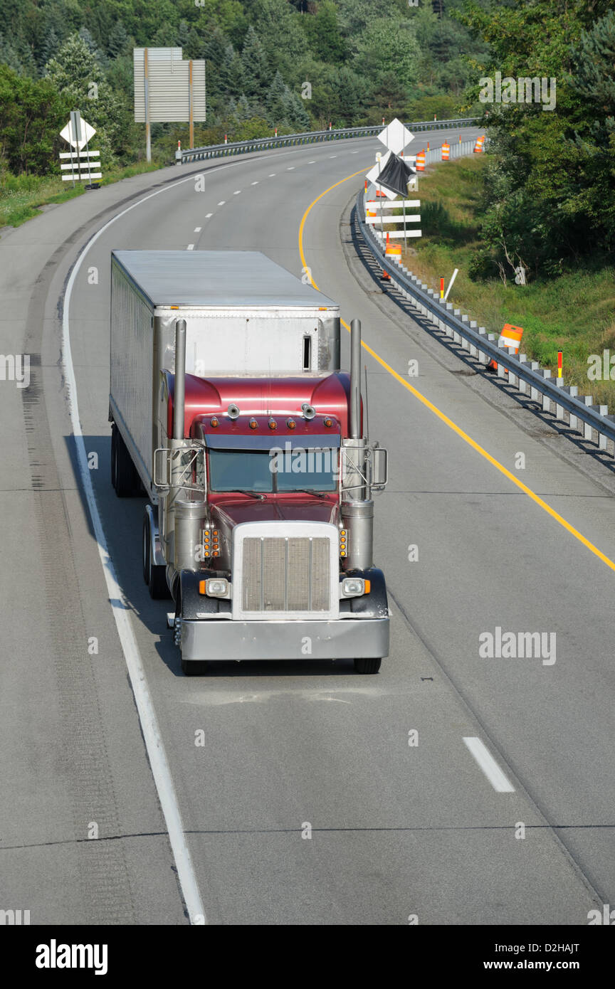 Truck traffic moving on an American interstate highway, commercial ...
