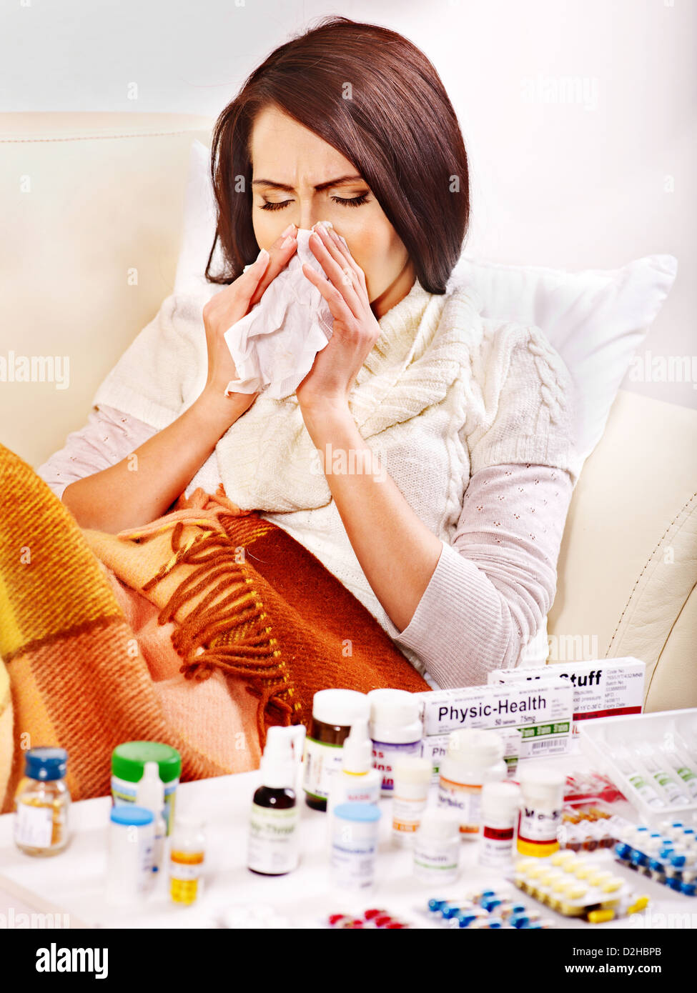 Woman with remedy having flue in bed Stock Photo - Alamy