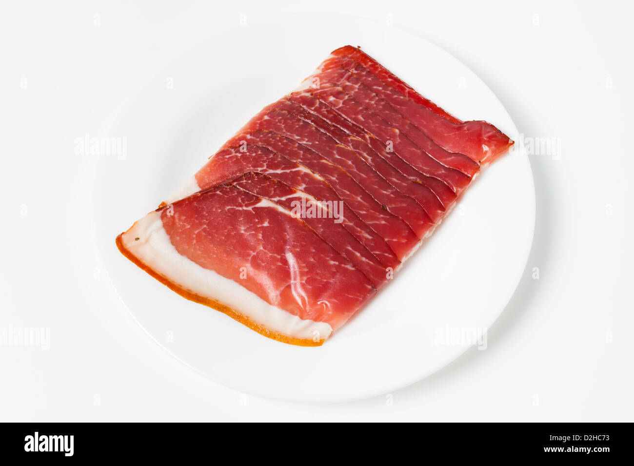 Pressed ham meat on a plate isolated over white background Stock Photo ...