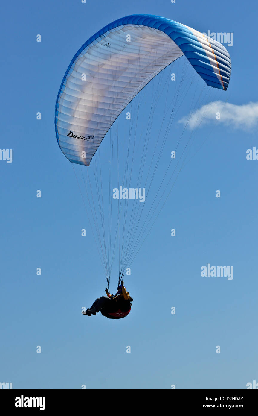 Man parasailing over a beach on the Great Ocean Road near Lorne in ...