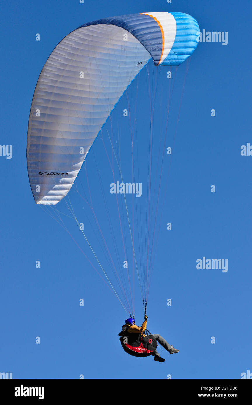 Man parasailing over a beach on the Great Ocean Road near Lorne in ...