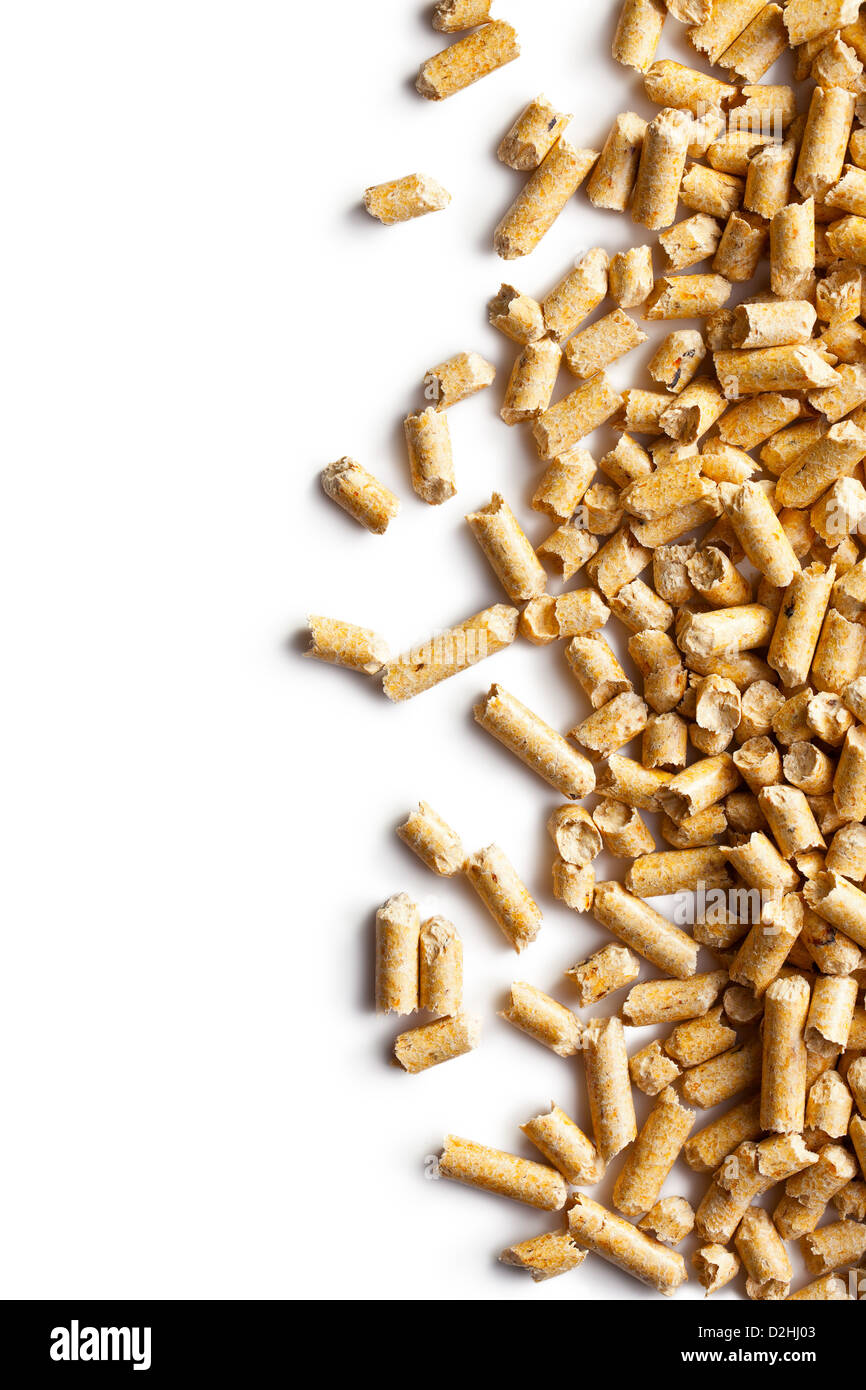 Wooden pellets -bio fuel on white background Stock Photo - Alamy
