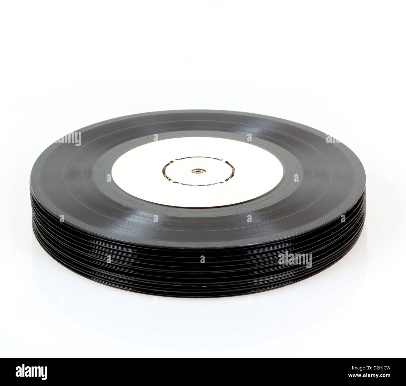 stack of black vinyl records on white background Stock Photo - Alamy