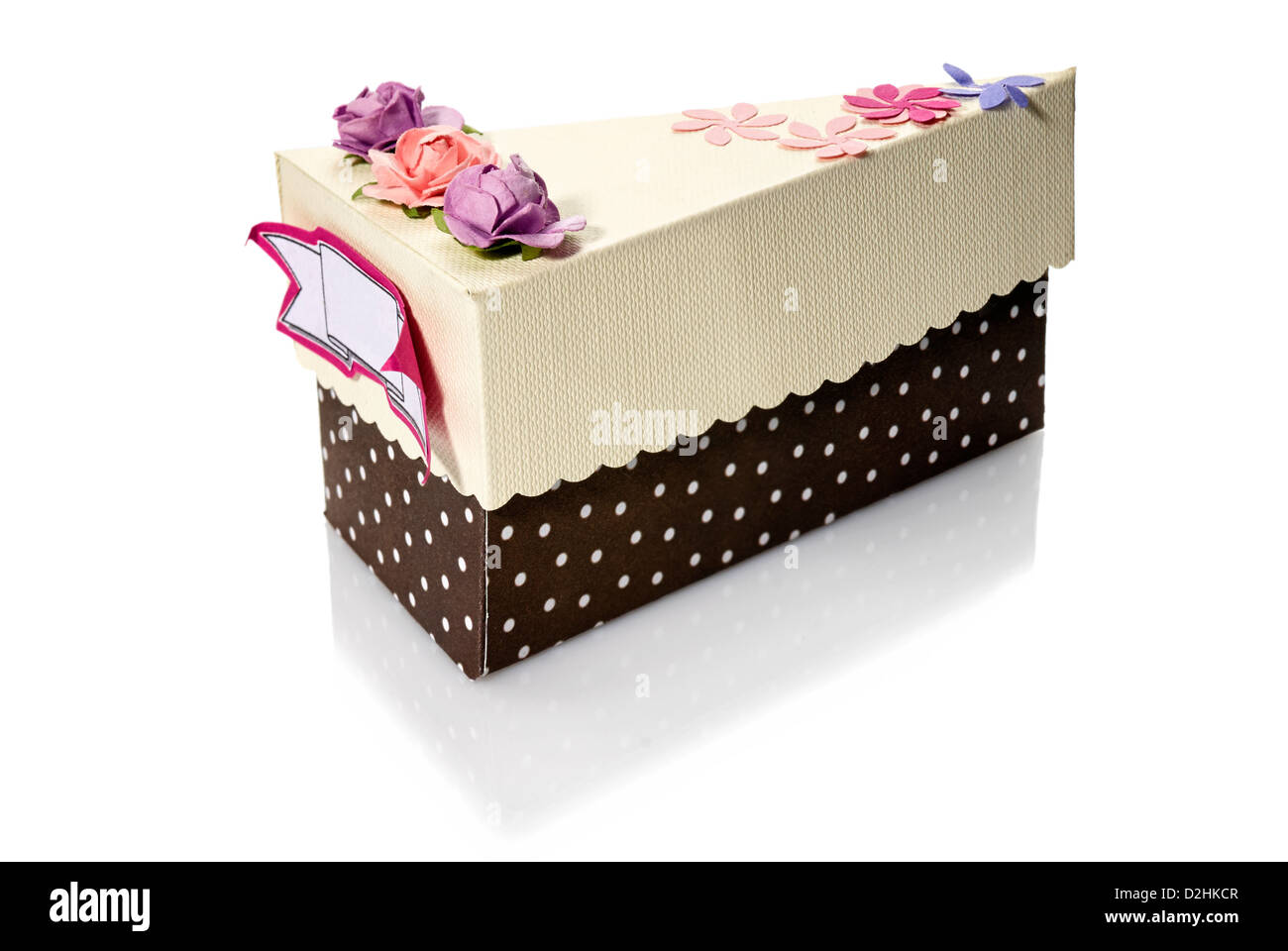 Studio shot of box-shaped piece of cake Stock Photo - Alamy