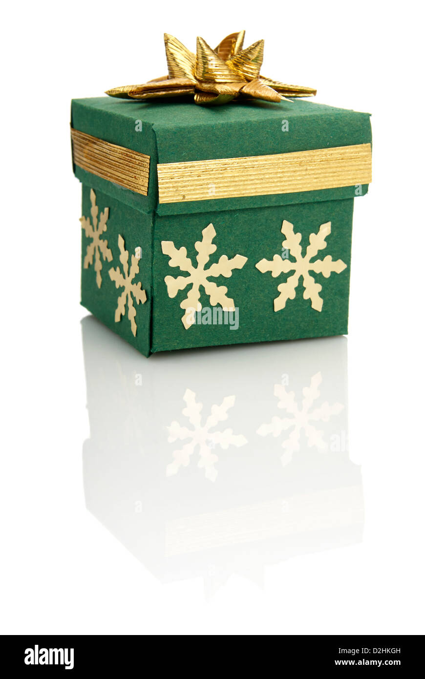 Paper snowflake on green Cut Out Stock Images & Pictures - Alamy