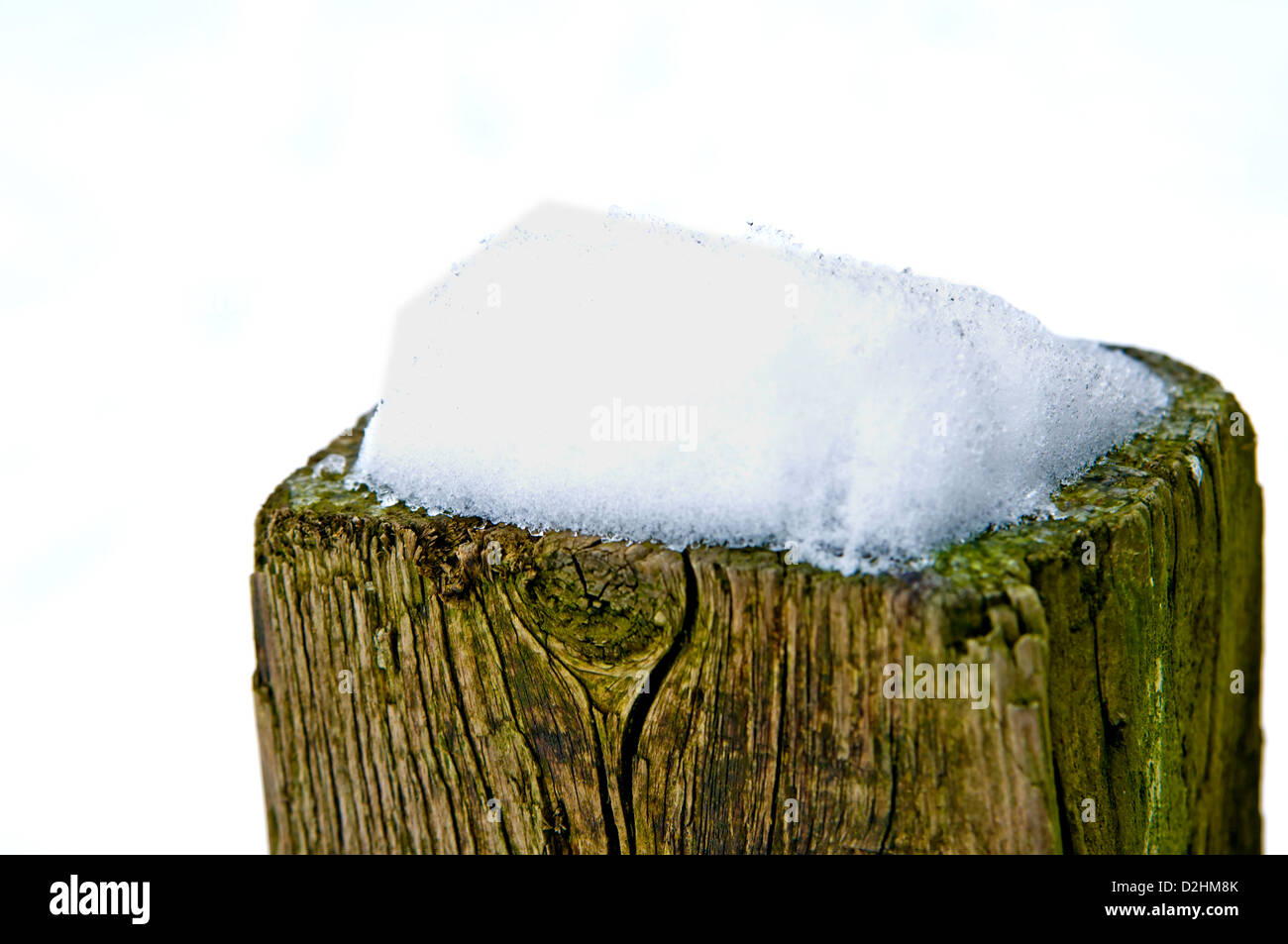 snow on fence post Stock Photo - Alamy