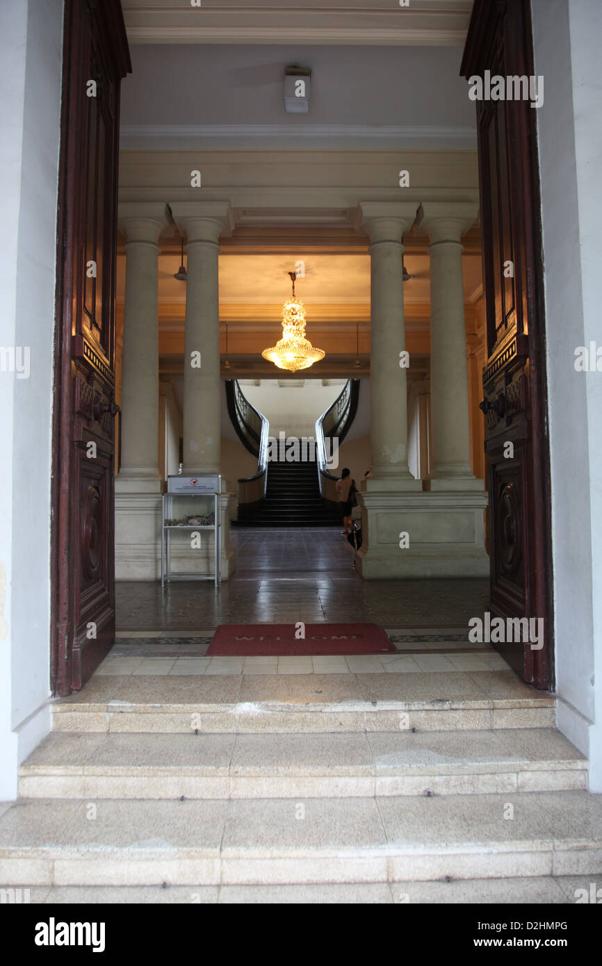 It's a photo of a old colonial style staircase in marble stone in a ...