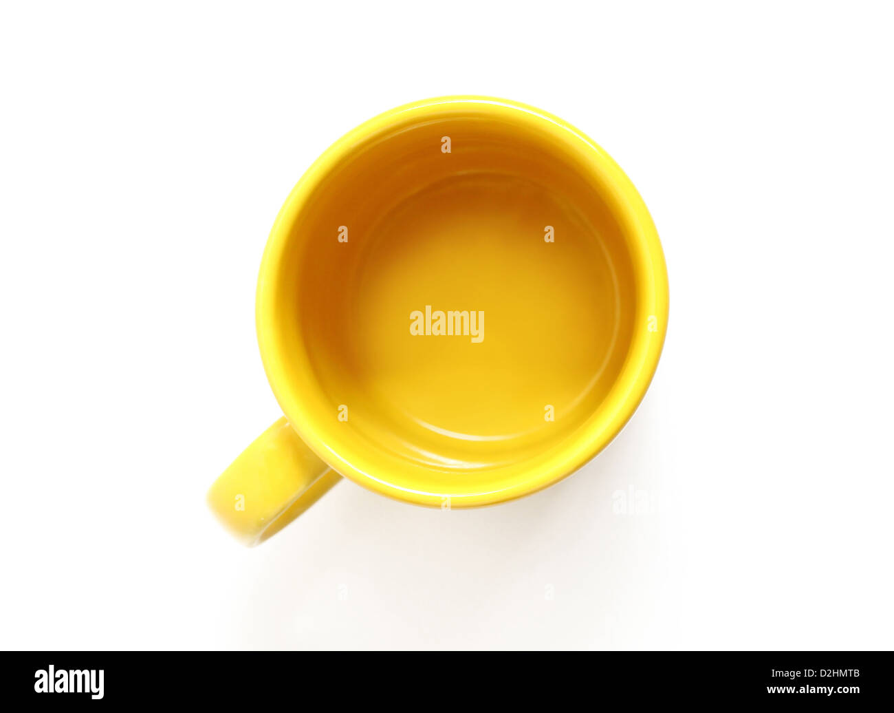 Yellow cup isolated on white Stock Photo - Alamy