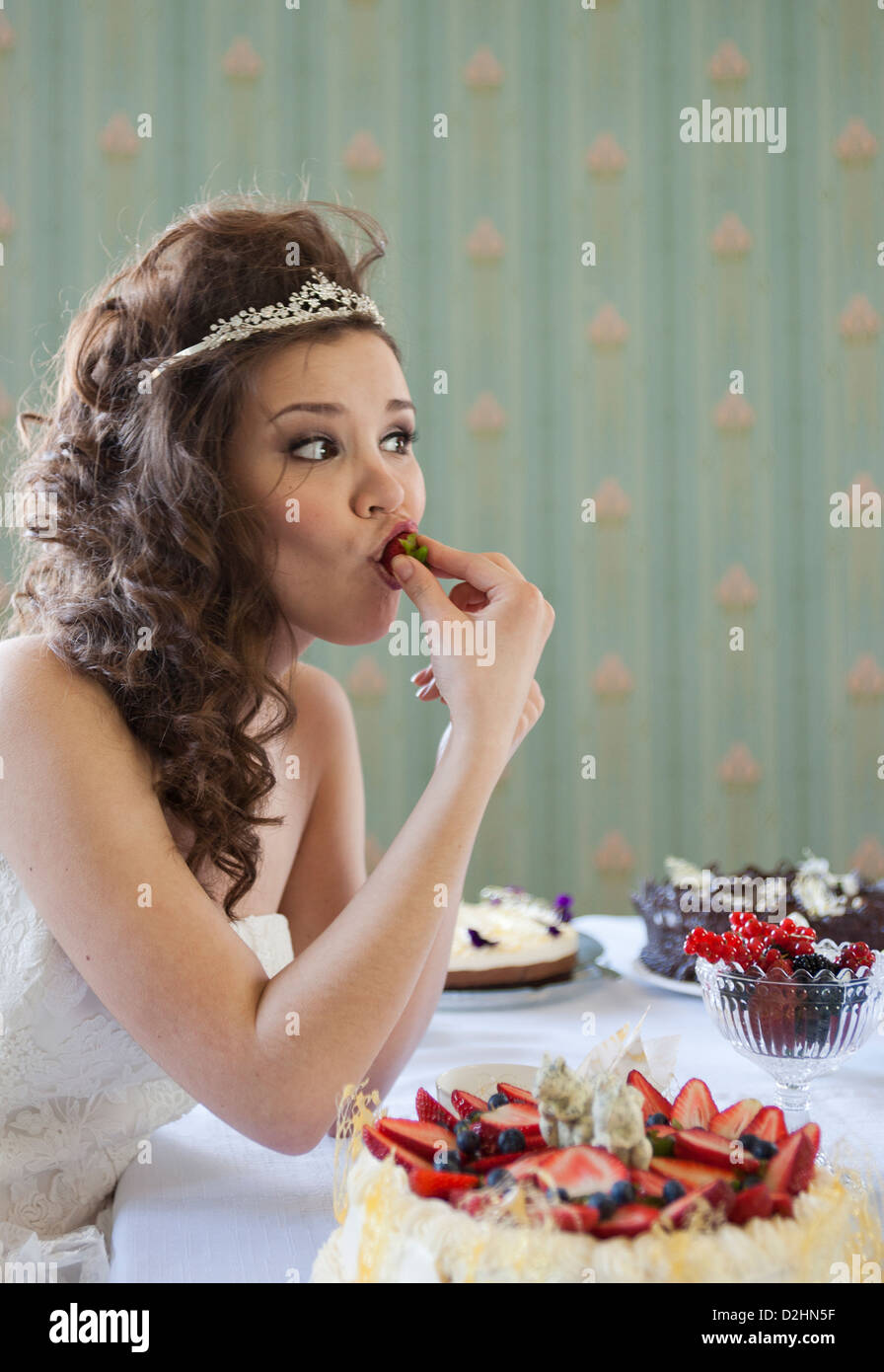 Woman eating chocolate cake strawberry hi-res stock photography and ...