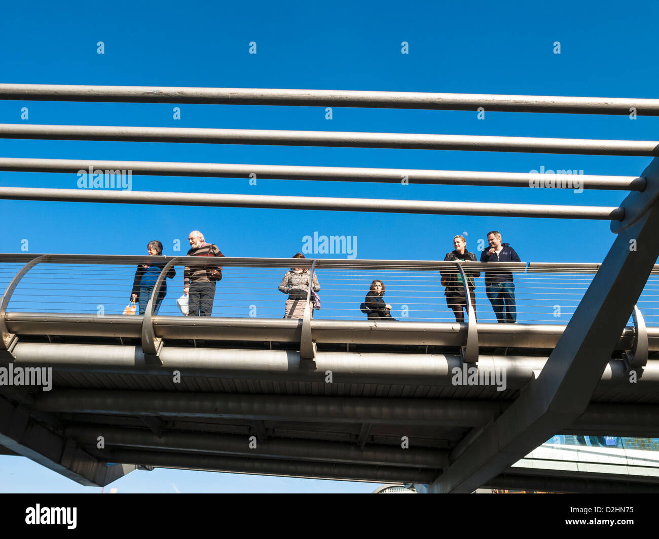 Millenium bridge people hi-res stock photography and images - Alamy