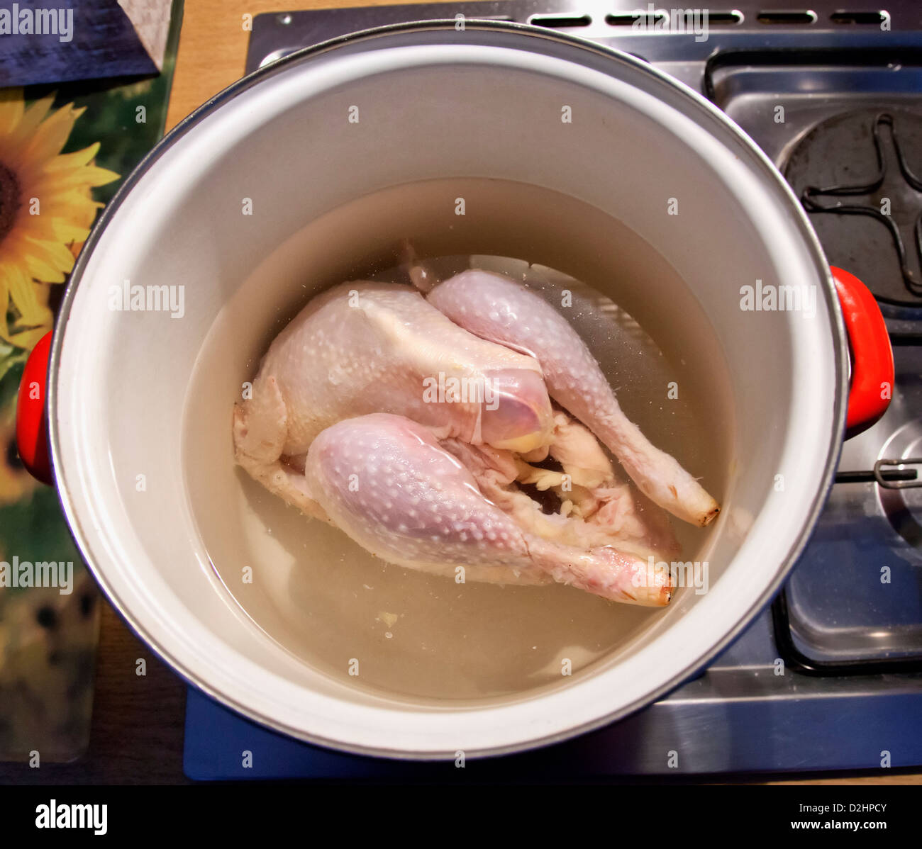 Hen in a pot, ready for cooking Stock Photo - Alamy