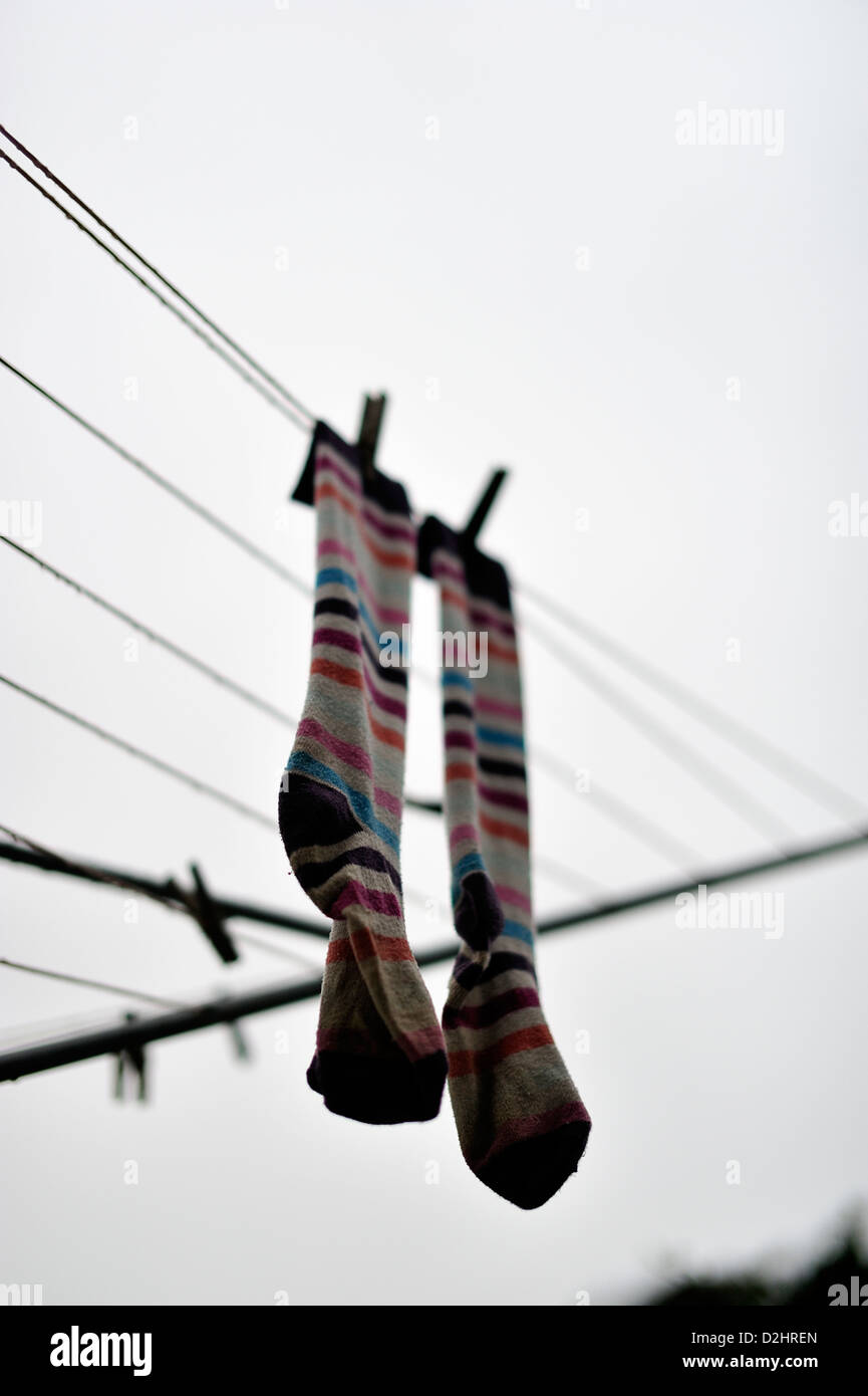 Socks On Washing Line High Resolution Stock Photography and Images - Alamy