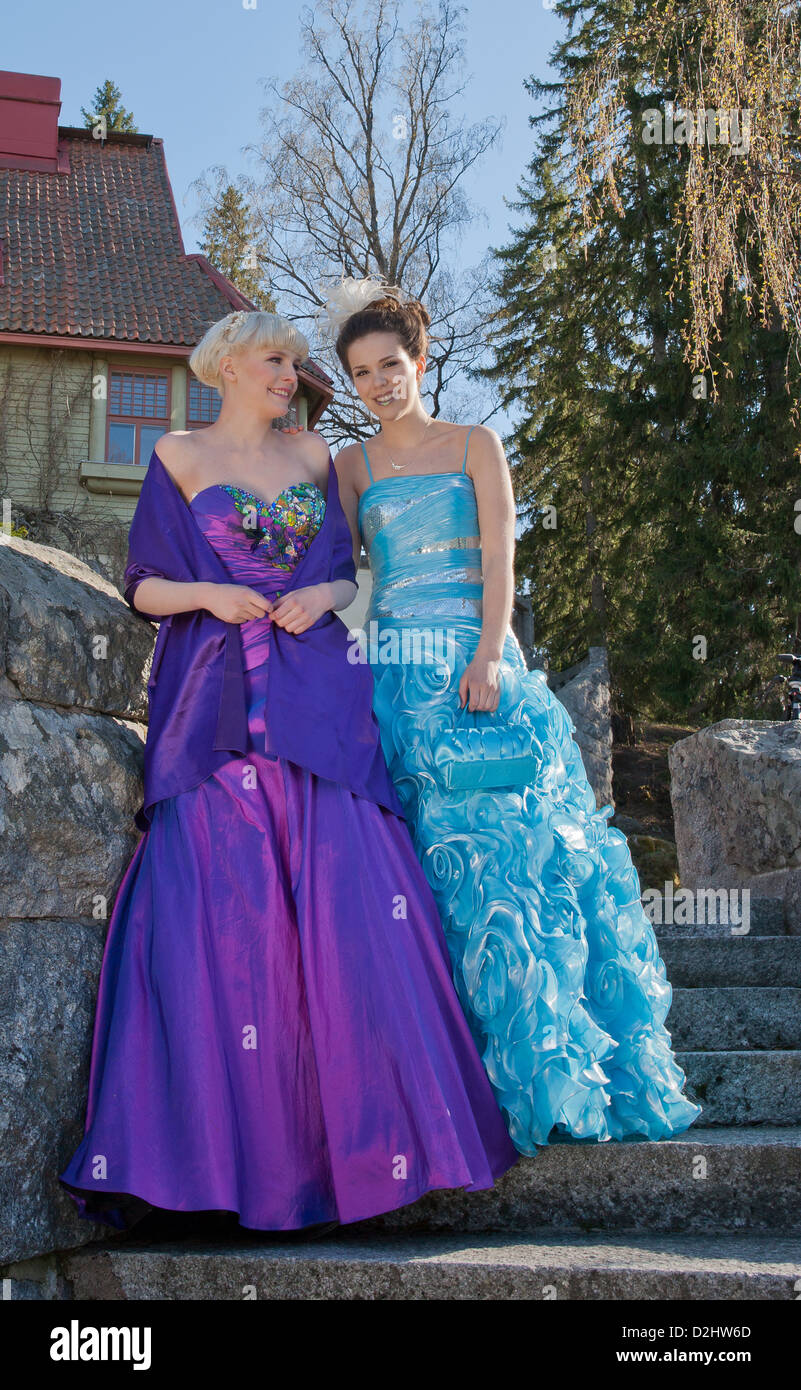 Two ladies in party dress talk, front castle Stock Photo - Alamy