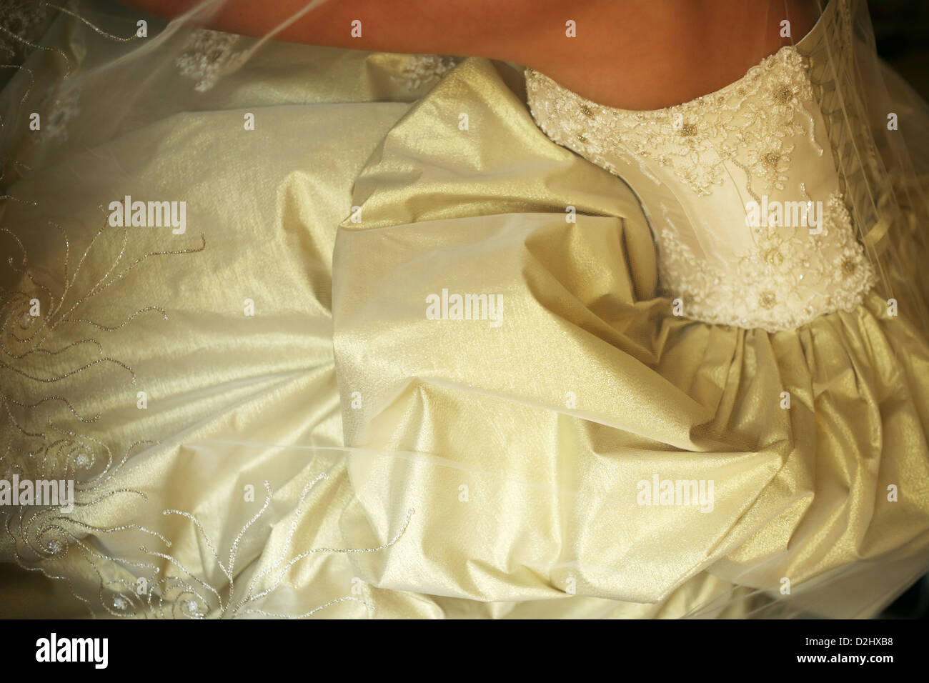 Beautiful gold dress of a bride Stock Photo - Alamy