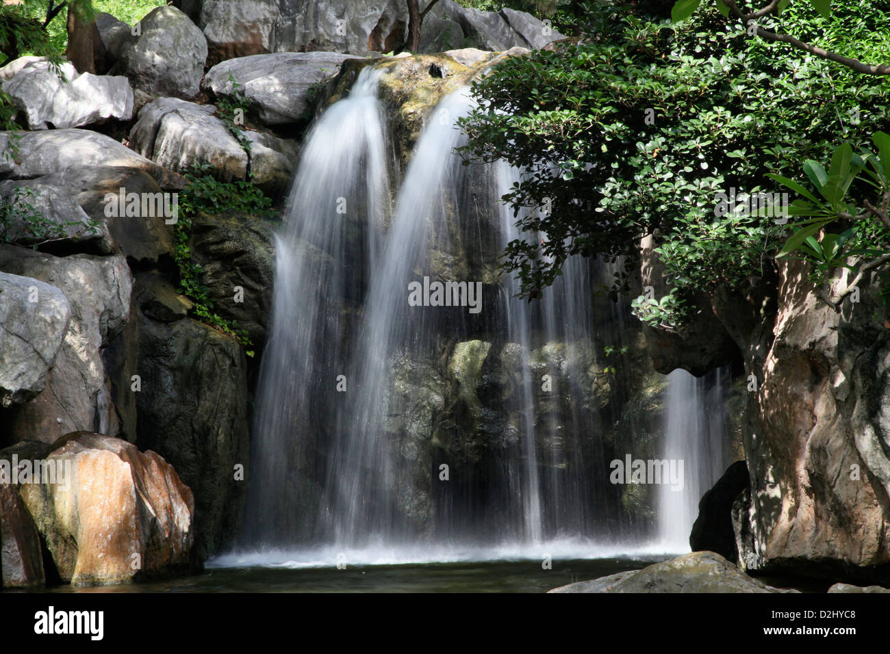 A gentle waterfall gives this scene a delightful, serene atmosphere ...