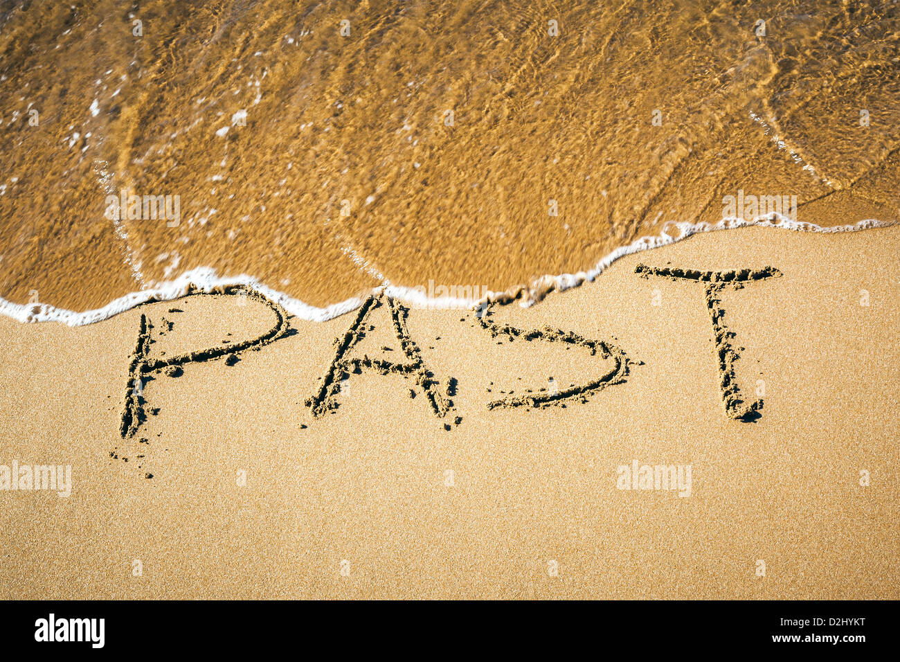An image of a word in the sand: PAST Stock Photo - Alamy