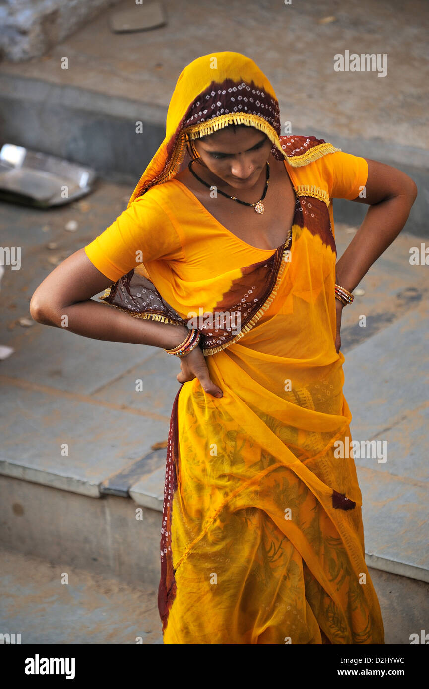 Traditionally dressed woman looking at something interesting Stock ...