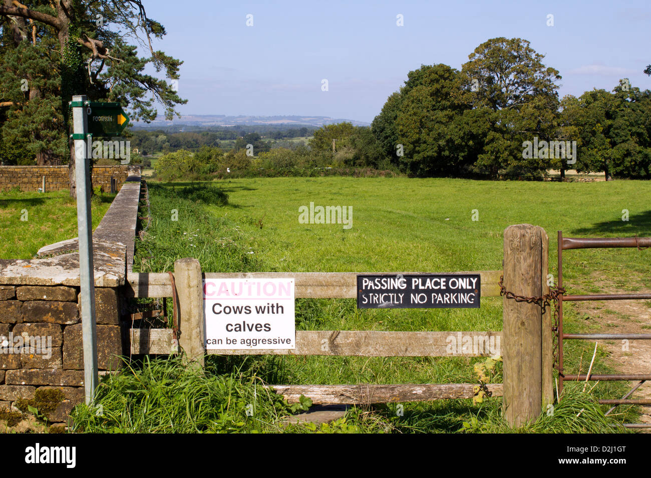 Cows With Calves can be aggresive warning sign by a footpath stile to a ...