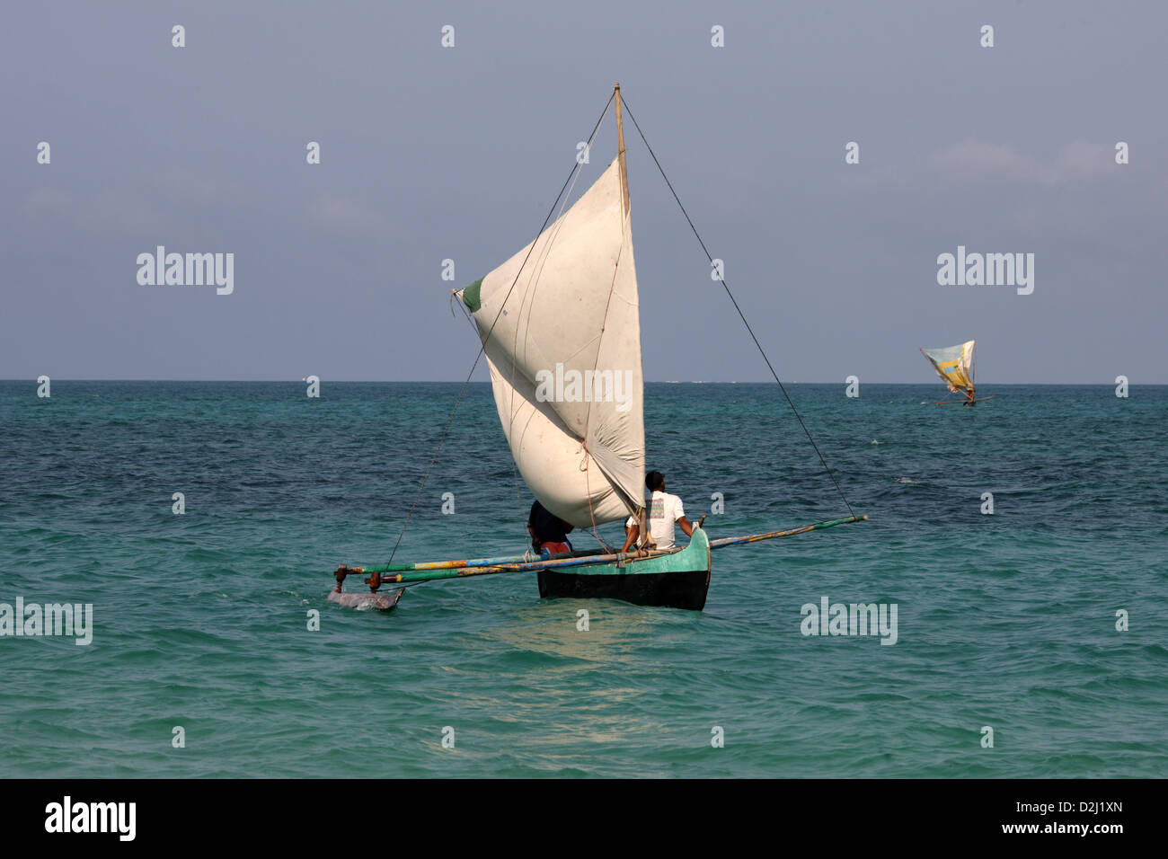Malagasy Outrigger Pirogue with Patchwork Sail, Anakao, Madagascar ...