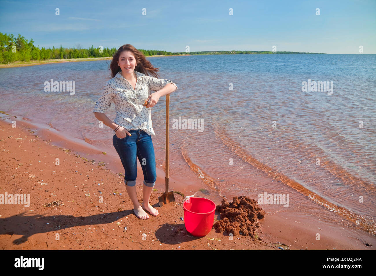 Woman Digging Clams High Resolution Stock Photography and Images - Alamy