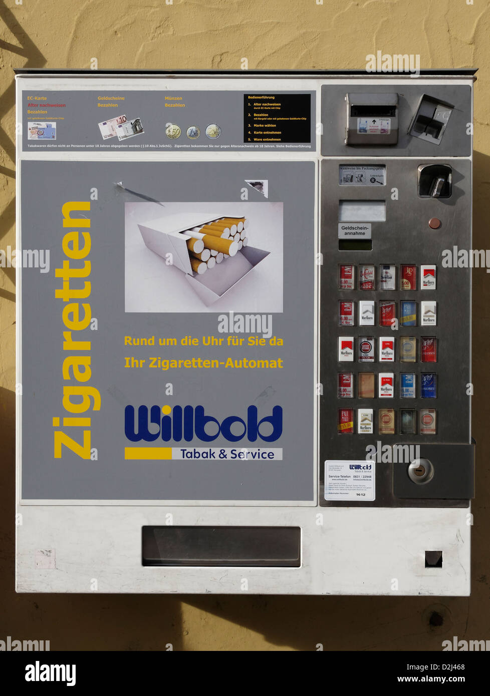 A cigarette vending machine outside the railway station at Füssen ...