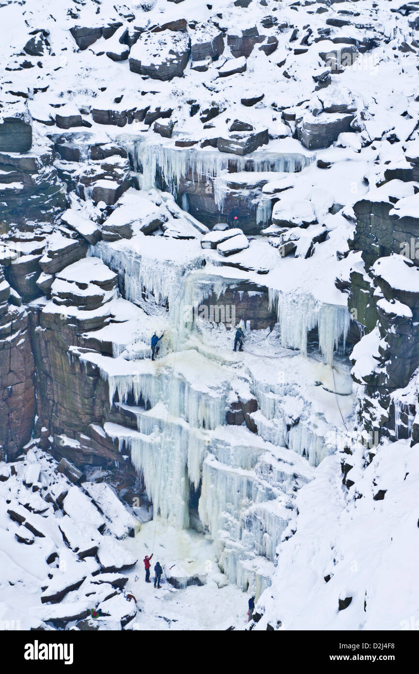 English Peak District, UK. 25th January 2013. Ice climbers climbing a ...