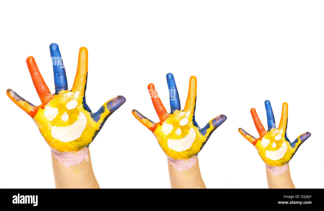 Three colorful hands in paint with a smile. Family concept Stock Photo ...