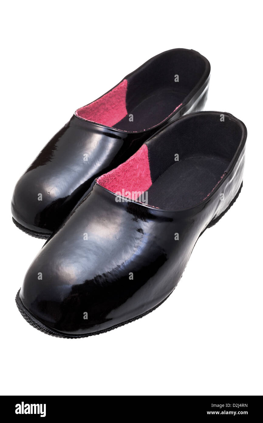 black rubber galoshes isolated on white background Stock Photo - Alamy